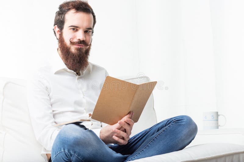 Relaxed Student Reading in His Living Room Stock Image - Image of read ...
