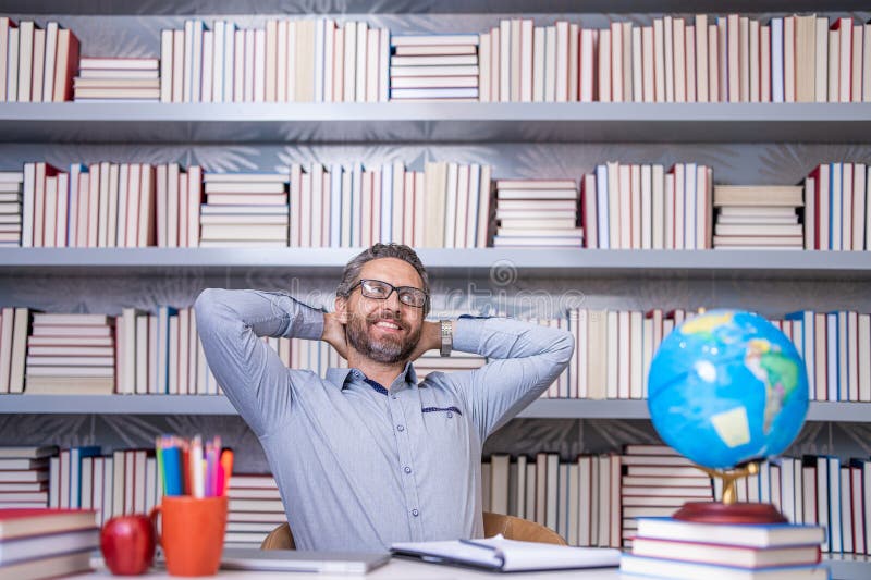 Relaxed Teacher Getting Knowledge and Education at Teachers Day in ...