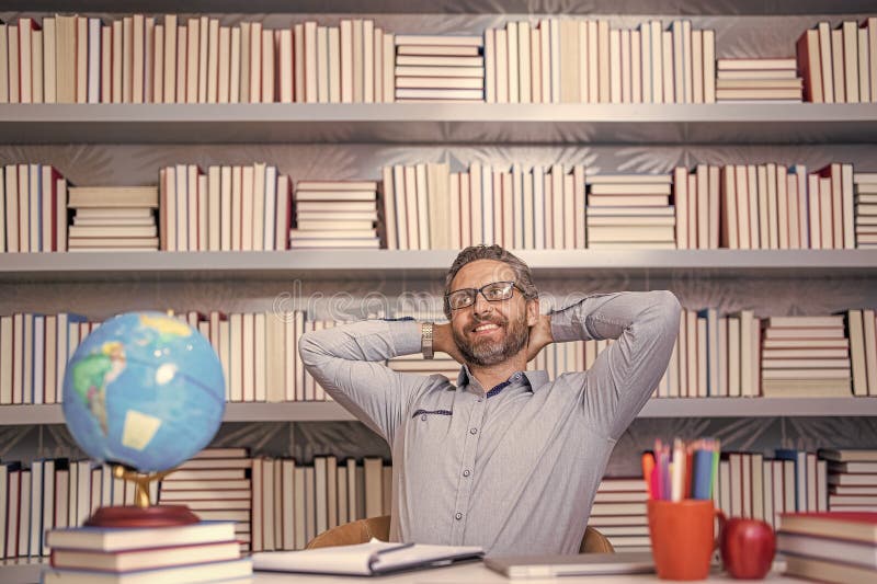 Relaxed Teacher Getting Knowledge and Education at Teachers Day in ...