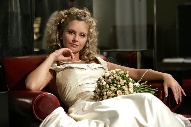 Relaxed young adult bride stock image. Image of sits - 10647375