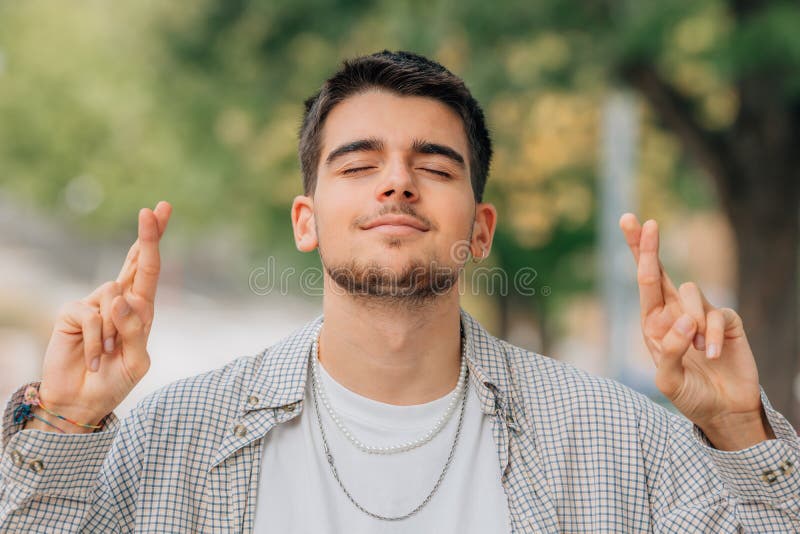 Relaxed young man outdoors stock image. Image of joyful - 262495051