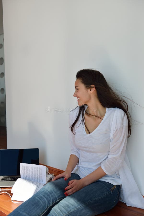 Relaxed Young Woman at Home Working on Laptop Stock Photo - Image of ...