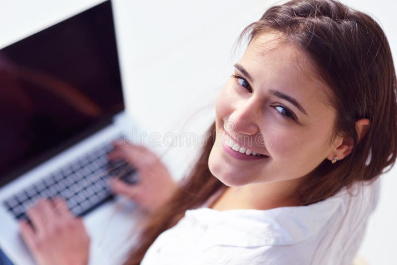 Relaxed Young Woman at Home Working on Laptop Computer Stock Image ...