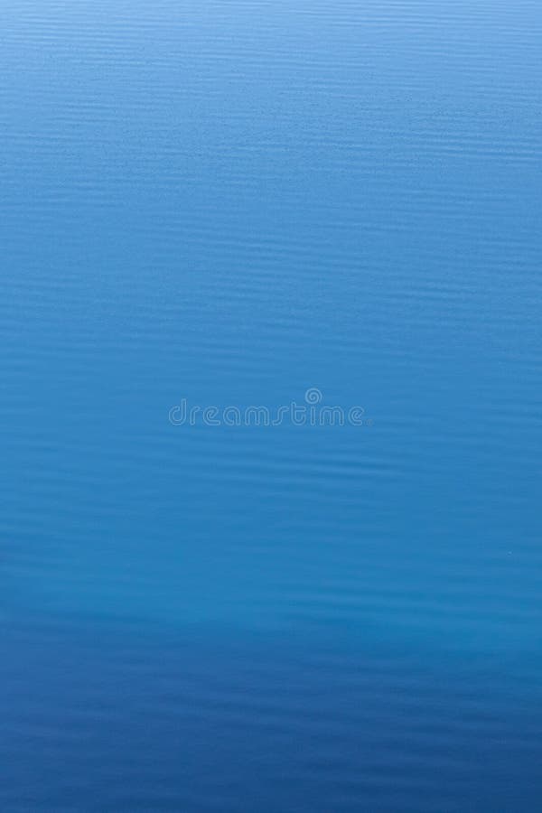 Relaxing Background of Small Waves and Ripples of Vibrant Blue Water ...