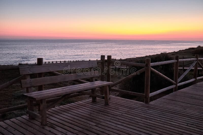 Relaxing Bench in a Wooden Path at the Sunset in the Beach, Peace and ...
