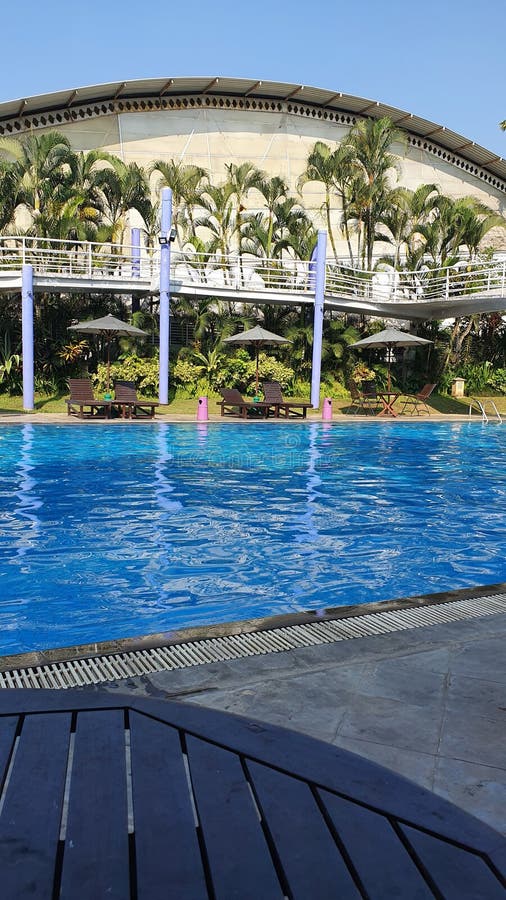 Relaxing Blue Water Pool with Huts and Trees in Summer Day Stock Image ...