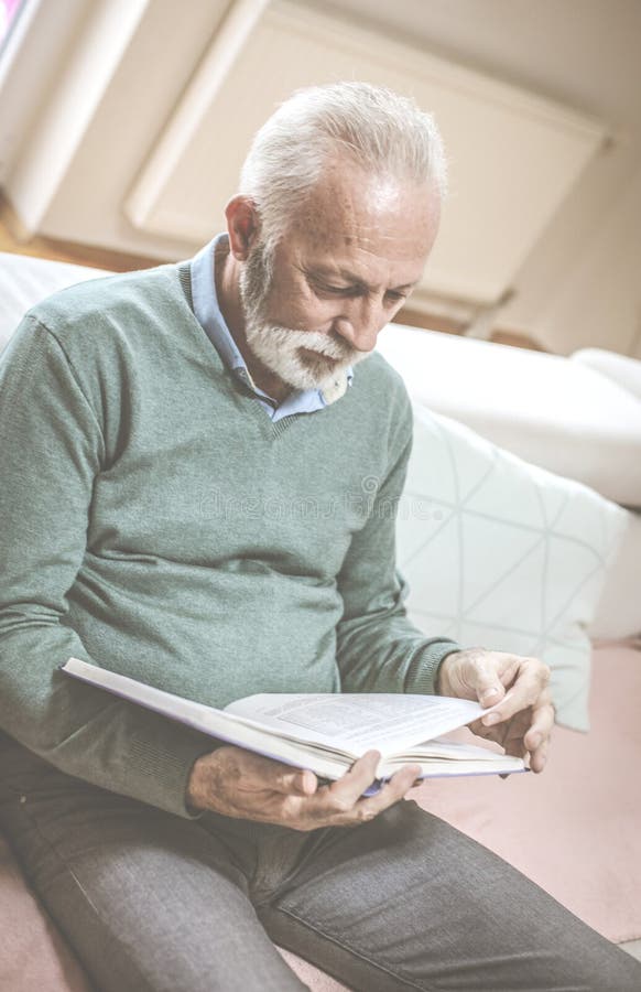 Relaxing with book. stock photo. Image of ethnicity - 119965032
