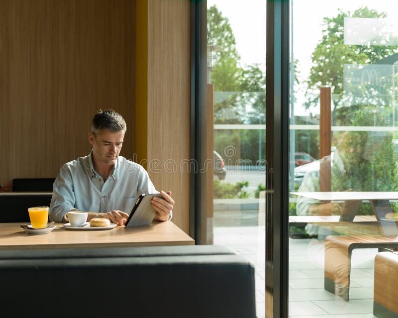 Relaxing Breakfast at the Cafe Stock Image - Image of relax, phone ...