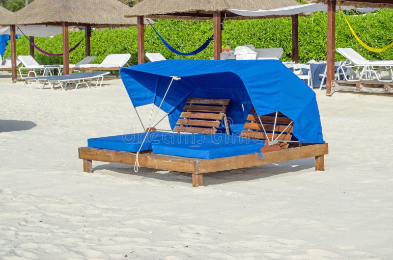 Relaxing Chairs at Beach for Sun Bath Stock Image - Image of relaxing ...