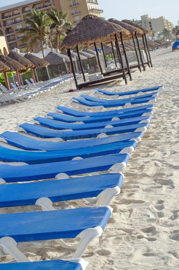 Relaxing Chairs at Beach for Sun Bath Stock Photo - Image of relax ...