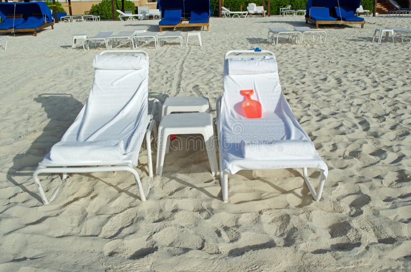Relaxing Chairs at Beach for Sun Bath Stock Image - Image of shade ...