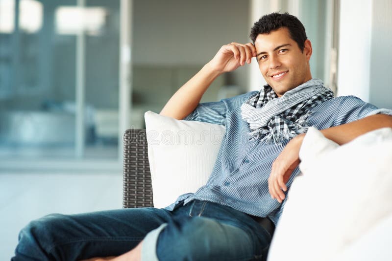 Relaxing on coach stock photo. Image of friendly, home - 18020520