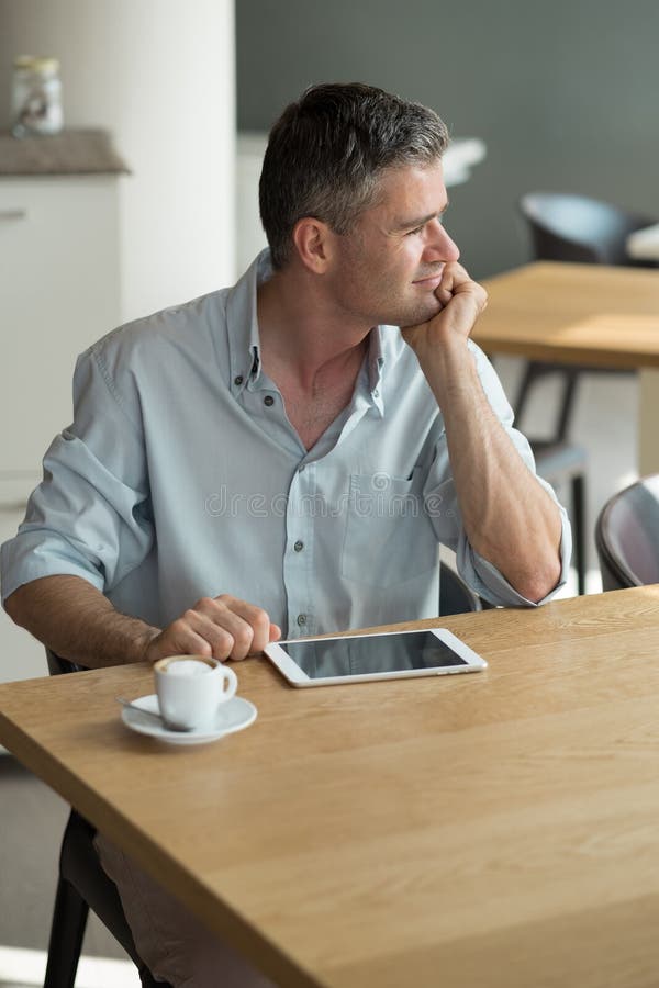Relaxing coffee break stock photo. Image of serene, restaurant - 80214054