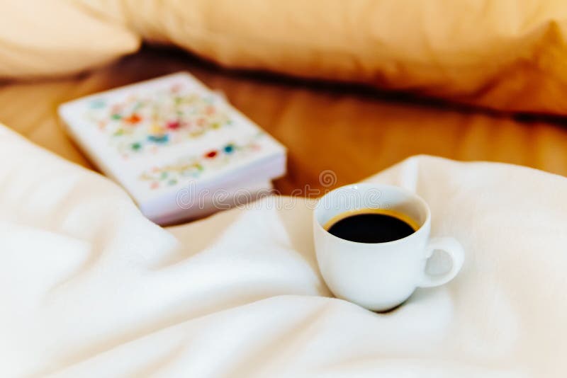 Relaxing with Coffee Cup and Good Books in Bed Stock Photo - Image of ...