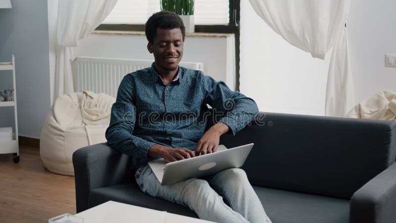 African American Black Person Writing Notes on Notepad Using a Pen ...