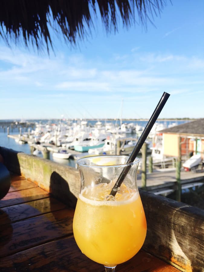 Relaxing with a drink stock image. Image of cocktail - 67722559