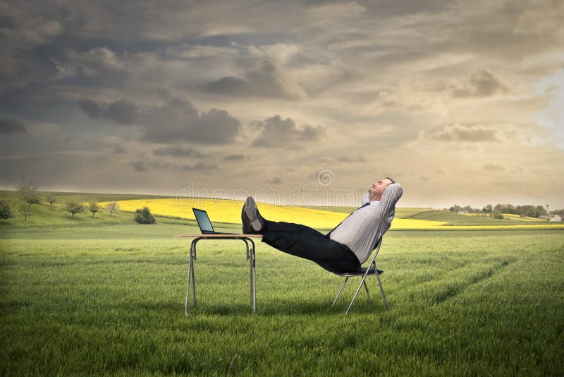 Relaxing in a field stock image. Image of nature, foot - 46370969