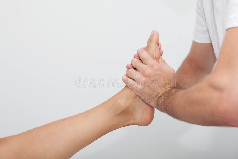 Relaxing foot massage stock photo. Image of hand, relax - 79756268