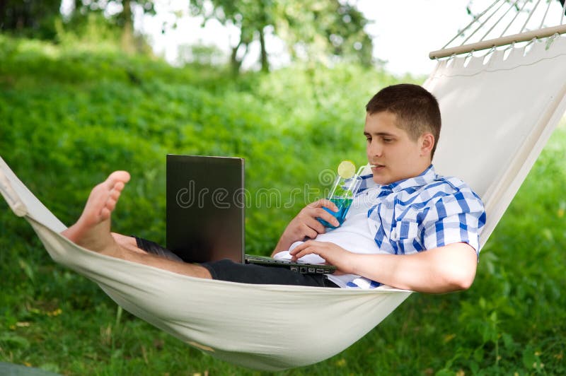 Relaxing on hammock stock photo. Image of internet, contemporary - 28976392