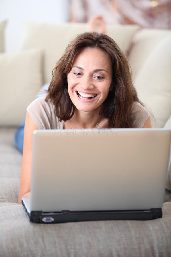 Relaxing at home stock image. Image of relaxed, internet - 15490669