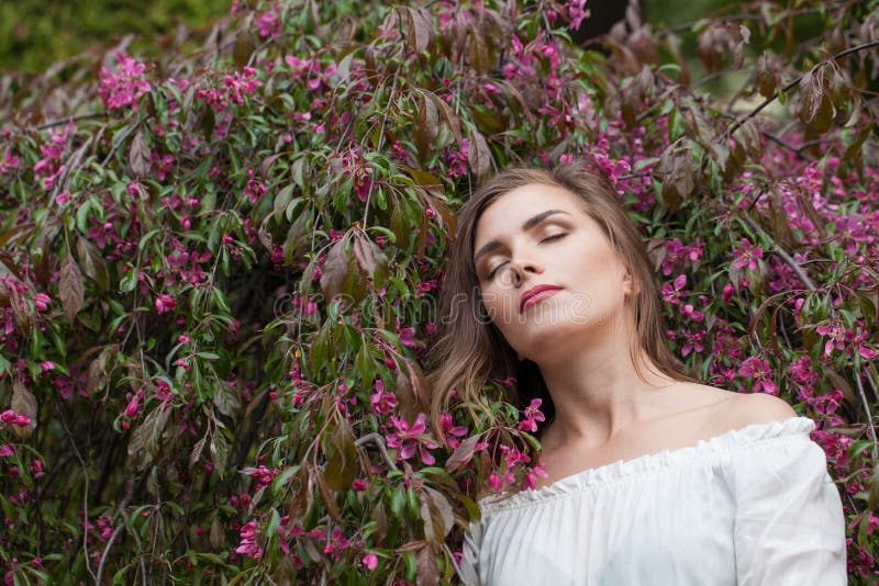 Relaxing Lady Female Model in Spring Leaves Background Stock Image ...