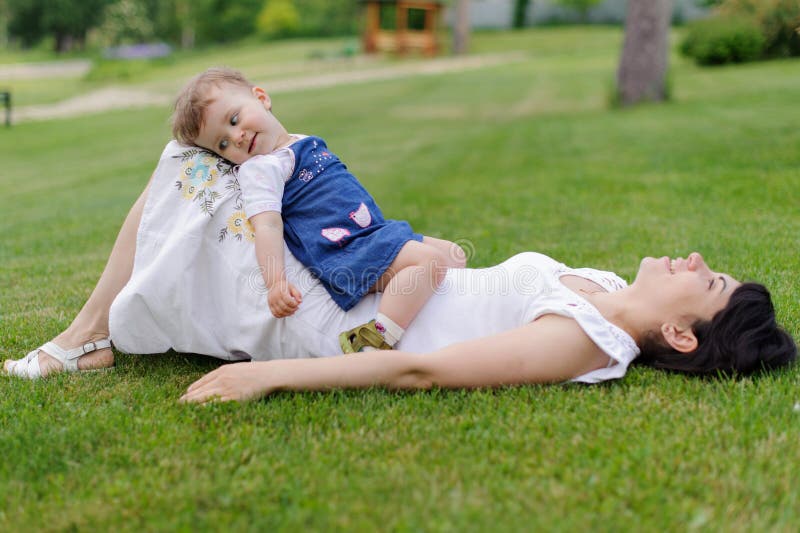 Relaxing Mother and Daughter Stock Photo - Image of female, color: 41237992