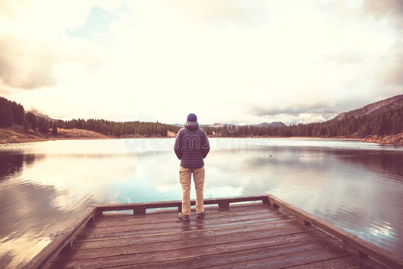 Relaxing on mountain lake stock photo. Image of morning - 156984690
