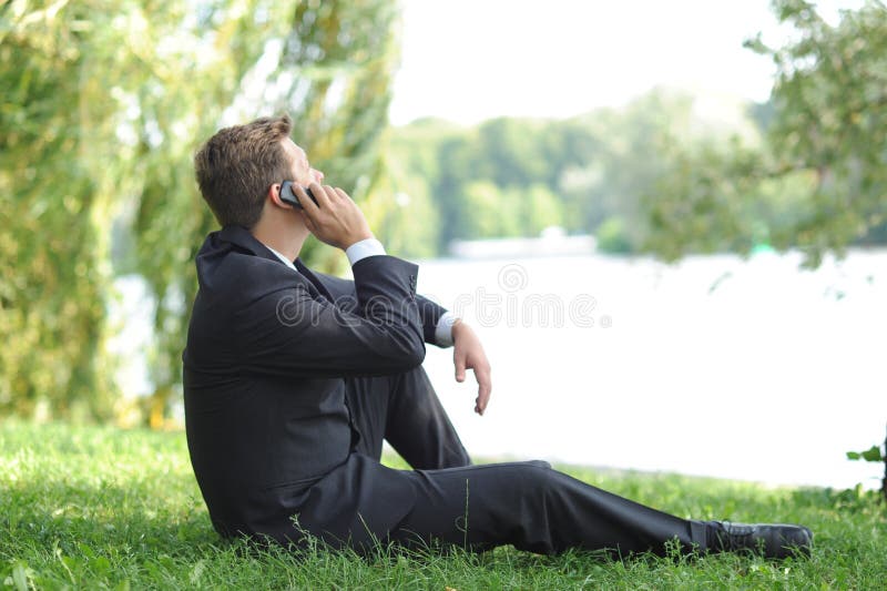 Relaxing in the park stock image. Image of conversation - 28553855