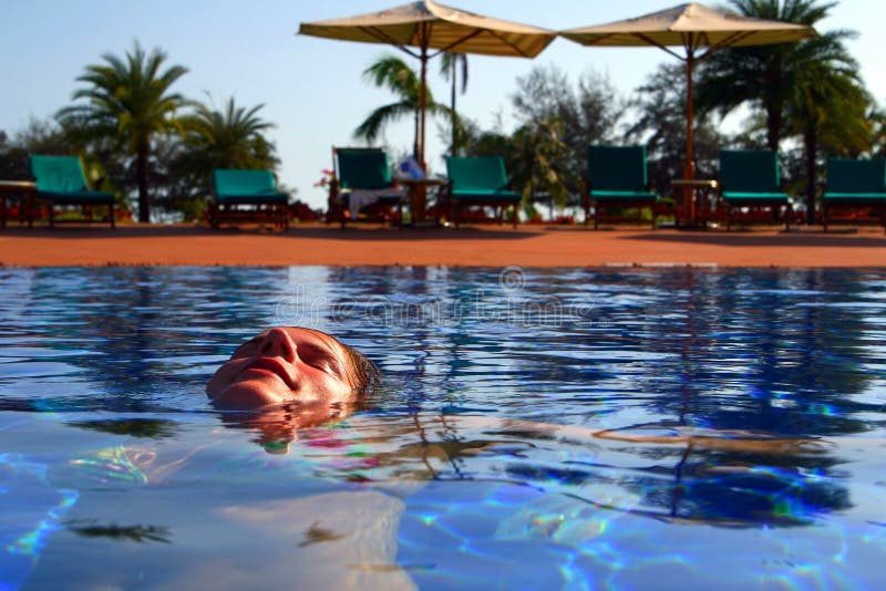 Relaxing in the Pool stock image. Image of hotel, recreational - 5483807