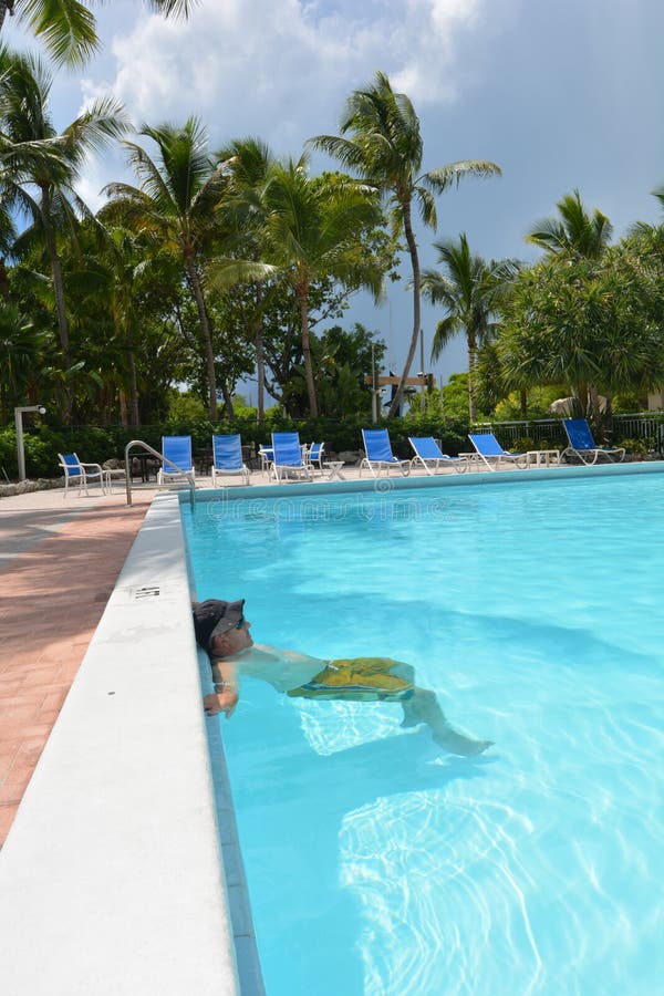 Relaxing in the Pool stock image. Image of resort, largo - 77816673