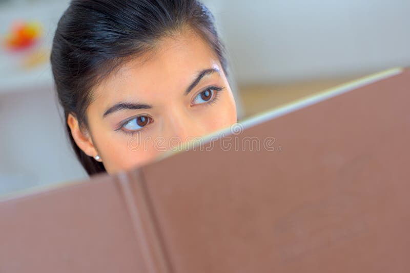 Relaxing by reading book stock photo. Image of couch - 89031490