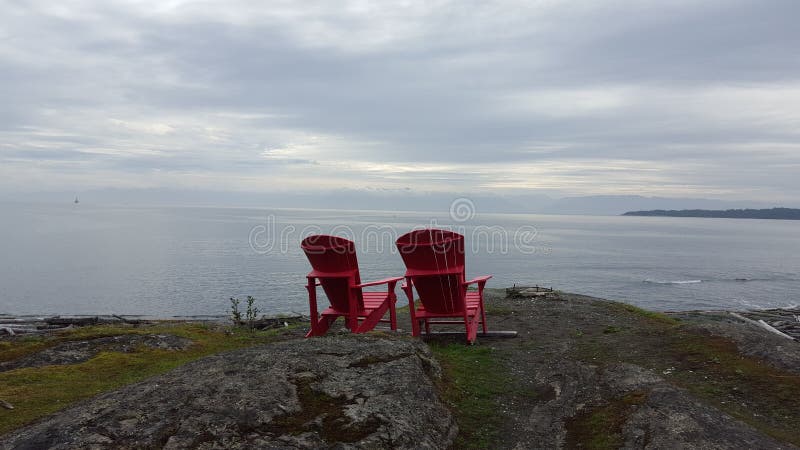 Relaxing in the red stock image. Image of waterview, oceanside - 65451257