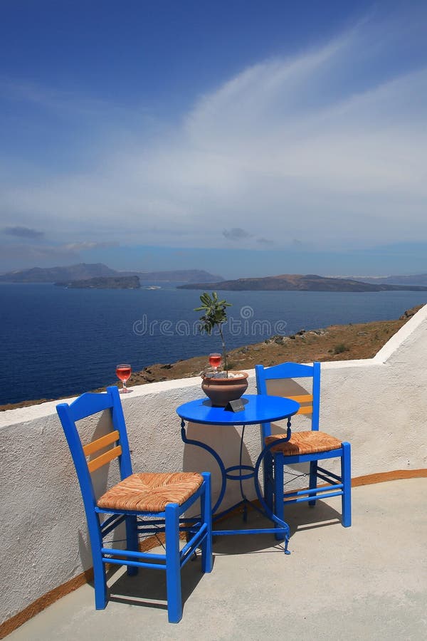 Relaxing in Santorini, Greece Stock Image - Image of chairs, mountain ...
