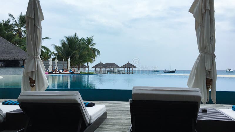Infinity pool in Maldives stock image. Image of leisure - 132014207