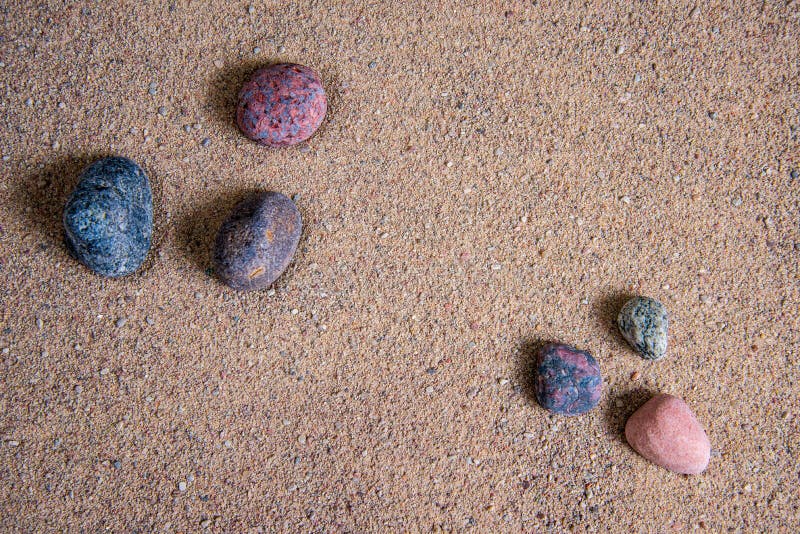 Relaxing Stones Laying on Sand Textured Pattern Stock Image - Image of ...