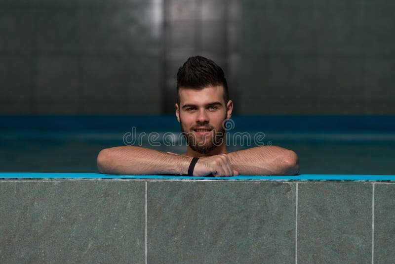 Relaxing in the Swimming Pool Stock Photo - Image of beauty, macho ...