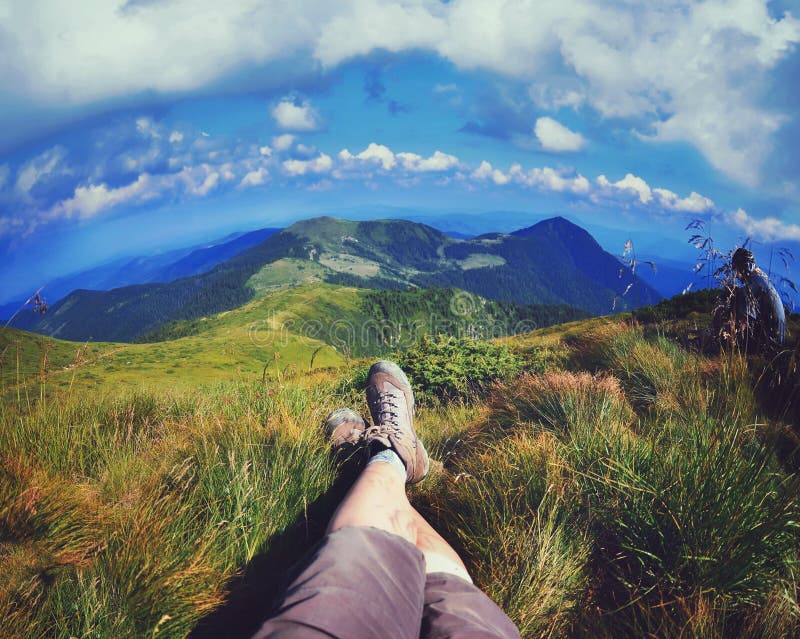 Relaxing Time during an Outdoor Trekking in Mountains Stock Photo ...