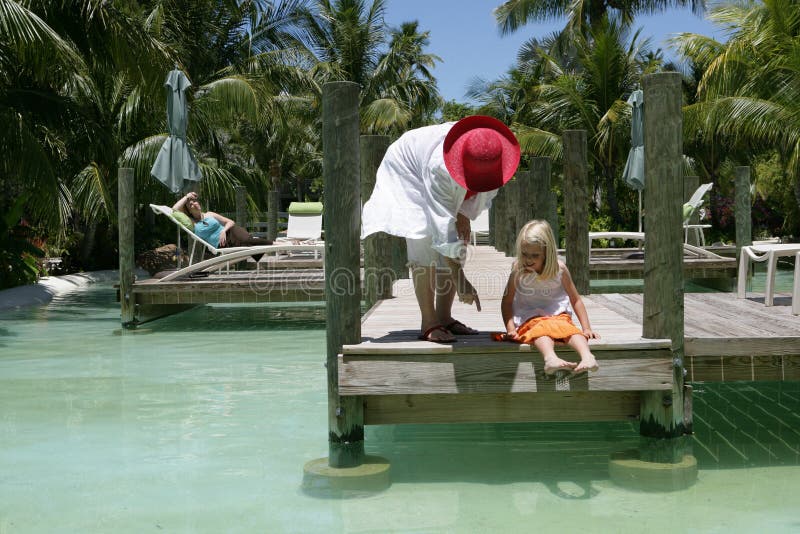 Relaxing on tropical dock stock photo. Image of summertime - 5221540