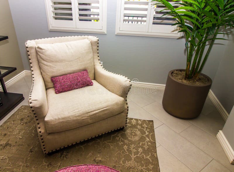 Relaxing White Easy Chair with Decorative Studs Stock Photo - Image of ...