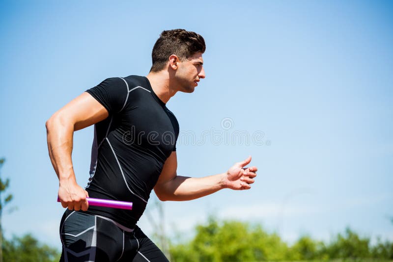 Relay Baton on Running Track Stock Image - Image of multi, racing: 74026113
