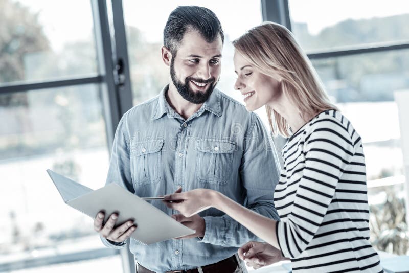 Reliable Skilled Partners Standing and Working with the Notebook. Stock ...