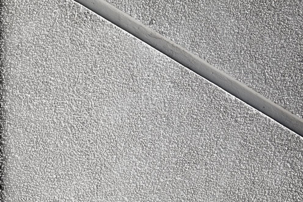 Relief Line is on an Empty White Stone Wall Stock Photo - Image of ...