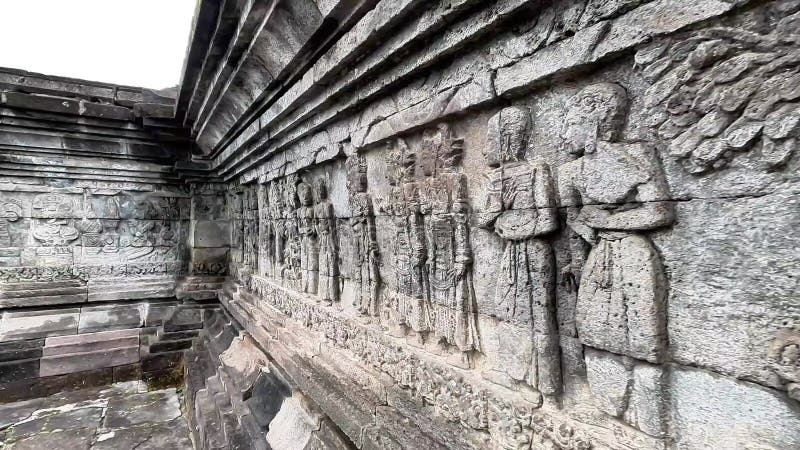 The Relief on the Wall of Penataran Temple Complex Stock Footage ...