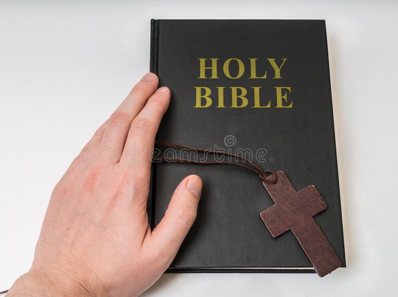 Religion Concept. Hand Touches Holy Bible Stock Photo - Image of cross ...