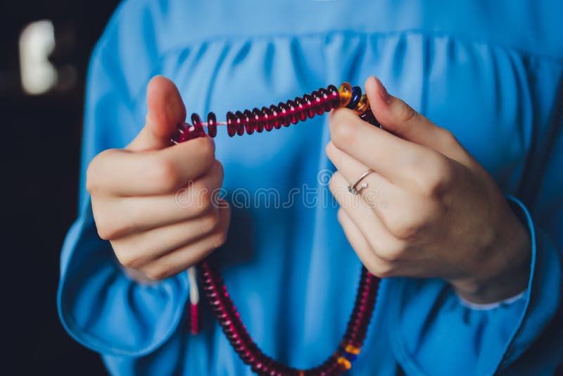Religious Asian Buddhist Woman Praying with Hand Holding Rosary Beads ... Religious Asian Buddhist Woman Praying with Hand Holding Rosary Beads ...