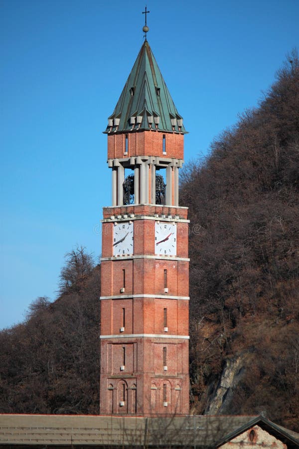 Religious Tower with Golden Cupola Under Blue Sky with Tree Alley in ...