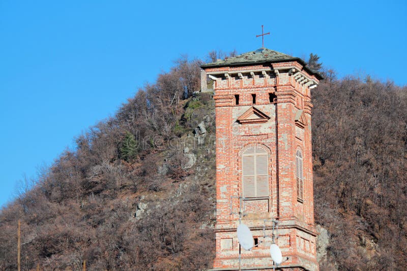 Religious Tower with Golden Cupola Under Blue Sky with Tree Alley in ...