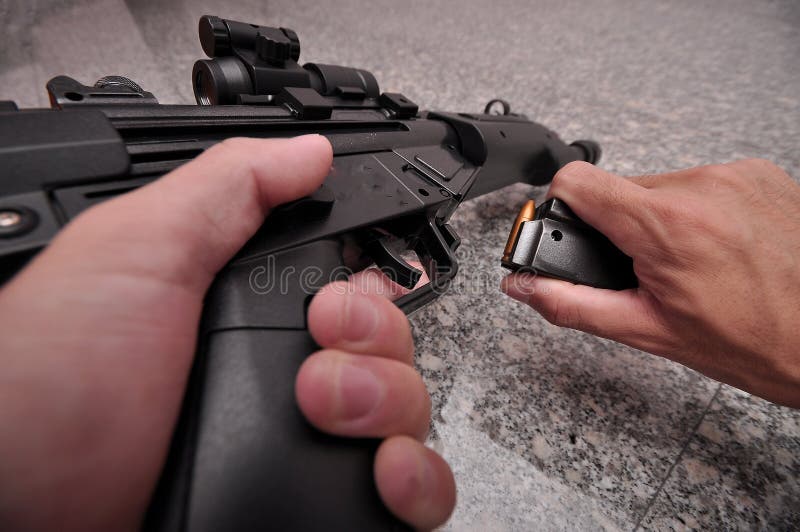Reloading Submachine Gun stock image. Image of delayed - 13749809