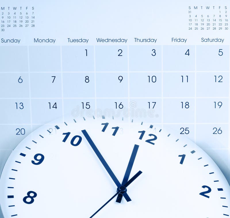 Reloj y calendario imagen de archivo. Imagen de primer - 214656519