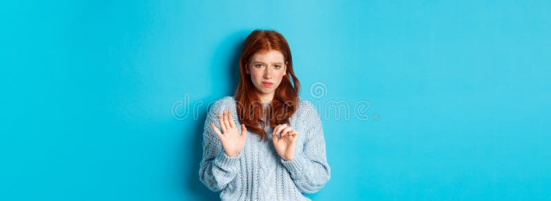 Reluctant Redhead Man In Glasses Raising Hands In Refusal Gesture Step